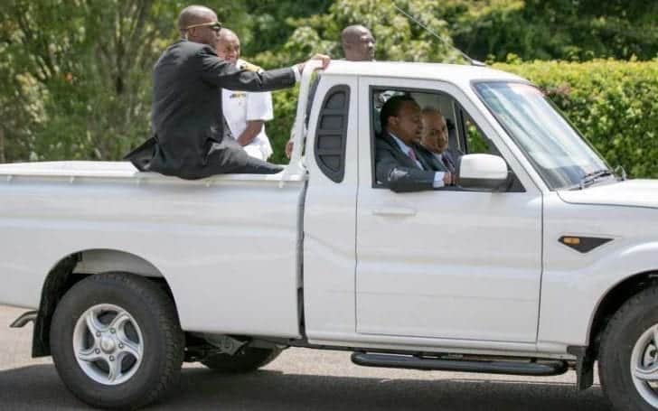 Uhuru test drives first locally assembled Mahindra vehicle